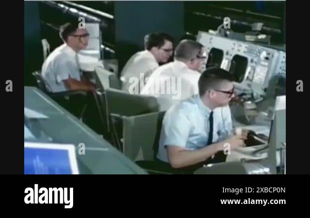 1966 - A flight controller is seen at work during a NASA mission Stock ...