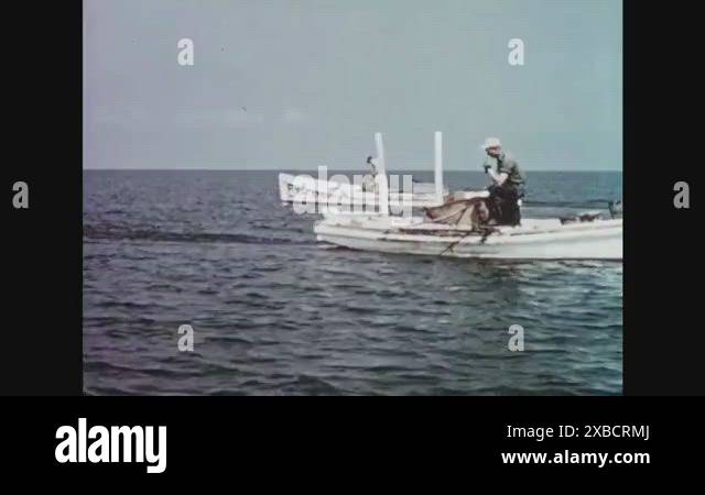 Shellfishers harvest crabs using scrapers in the Chesapeake Bay in the ...