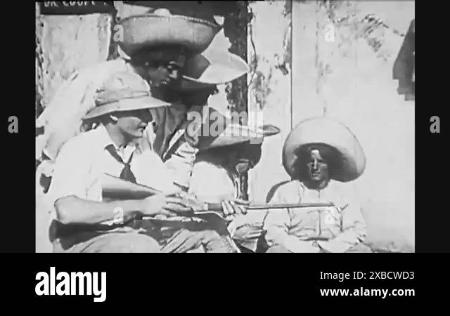 1913 - An American doctor stationed in the Philippines shows an elderly ...