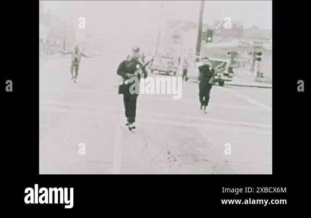 A police raid on black panther headquarters in the 1960's shows racial ...