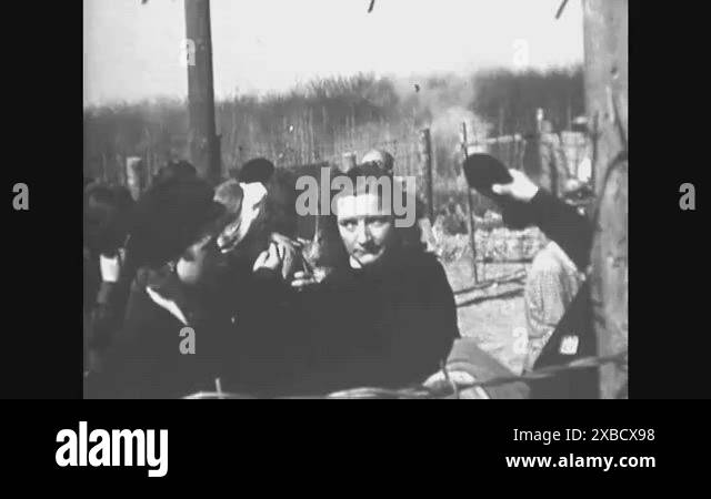 1945 - German civilians are shown survivors and corpses of Buchenwald ...