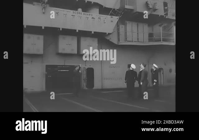 SAN DIEGO - 1950 - Vice Admiral Clifton Sprague looks up at the ...