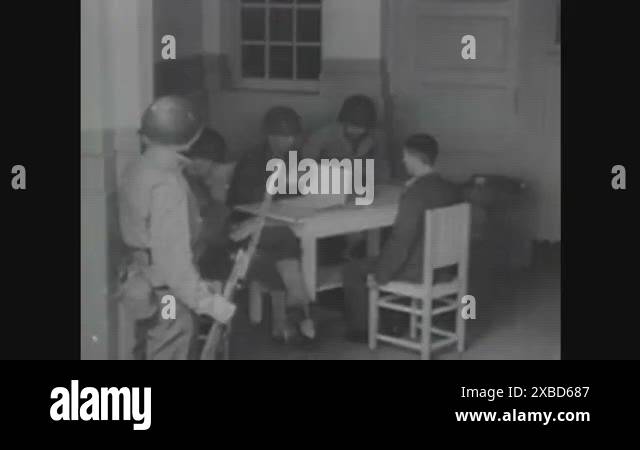 Nazi prisoners are interrogated and mass graves are discovered by ...