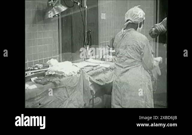Doctors operating on patient 1950s Stock Videos & Footage - HD and 4K ...