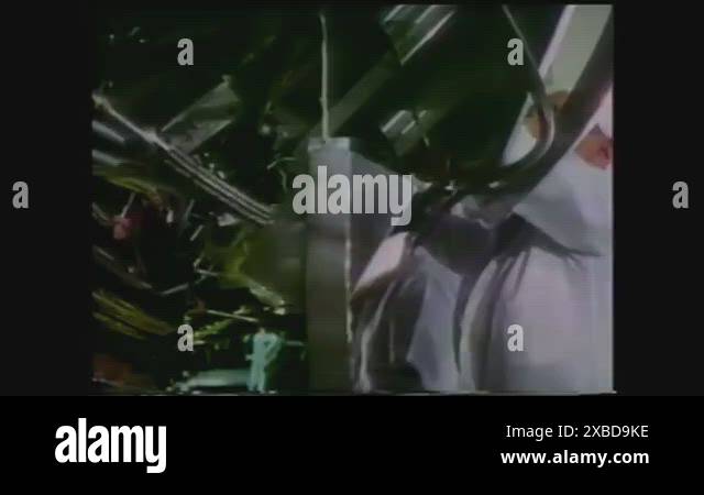 Footage of technicians preparing the Columbia command module where the ...