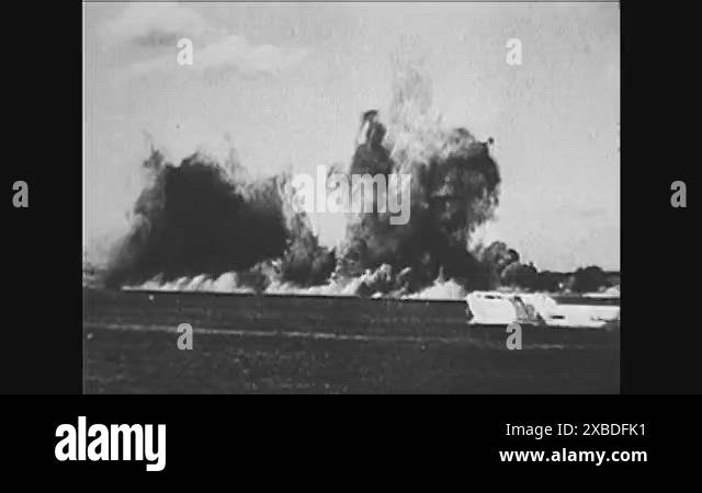 Airplanes drop bombs as part of the 1944 D-Day invasion of Normandy ...
