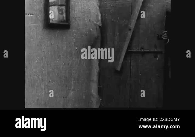 1920s footage of a Chinese man getting his hair braid snipped off as a ...