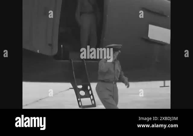 LIPA - 1945 - General Walter Krueger exits a plane, greets 11th ...