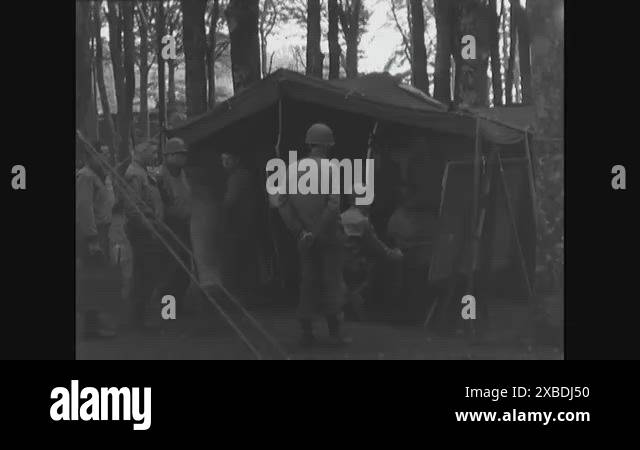 FRANCE - 1944 - Generals huddled underneath a tent conferring over ...