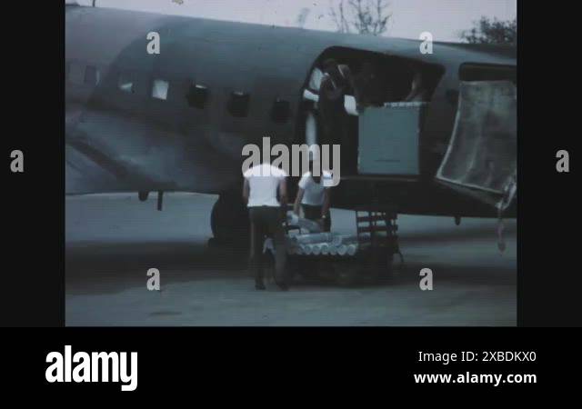 1968 - USAF airmen load flares into an AC-47D at Da Nang Air Base Stock ...