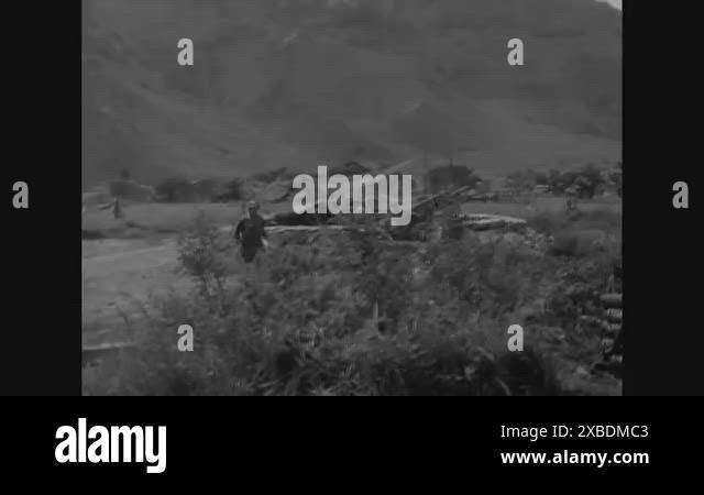 CHORWON - 1951 - Black 58th Field Artillery soldiers load and fire a ...