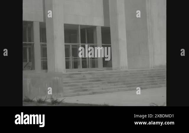 1957, Inside propulsion wind tunnel and ARO employees examining ...