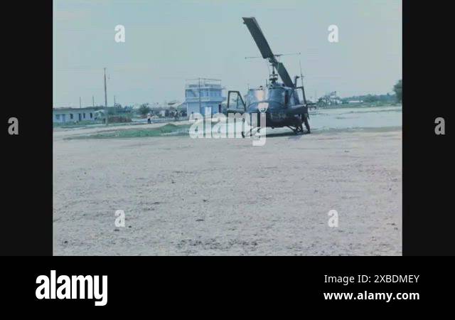1966 - American soldiers stationed in Vietnam use a helicopter to ...