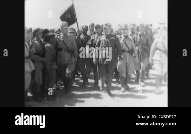 GREECE - 1945 - Benito Mussolini watches a horse demonstration and then inspects his troops ...