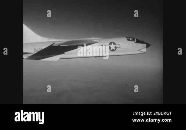 1964 - The pilot of a US Navy Vought F-8 Crusader is cleared for approach, goes over his flight ...