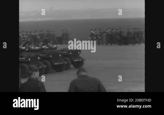 BERLIN - 1945 - Troops march on foot in formation and ride in jeeps on ...