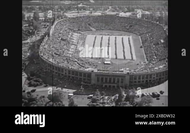 1950s - Crowds cheer when Joseph Stalin arrives at a stadium in Russia ...
