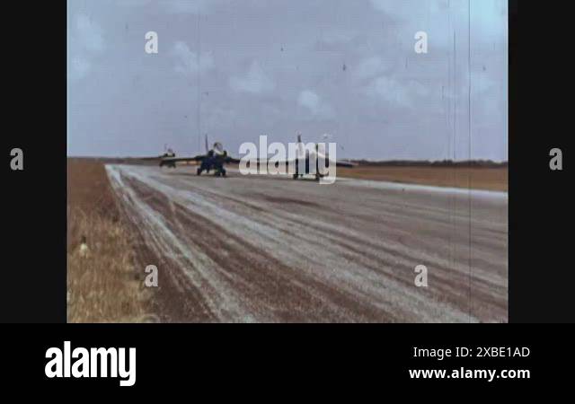1960s - US Navy Blue Angel Grumman Tiger jets taxi into position on a ...