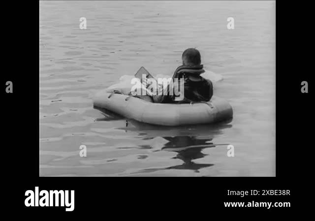 1942 - A US Army Air Force pilot in a studio demonstrates how to set up ...