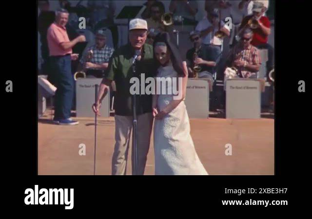1967 - Bob Hope sings I've Got a Crush on You to Miss World winner Madeleine Hartog-Bel at a USO ...