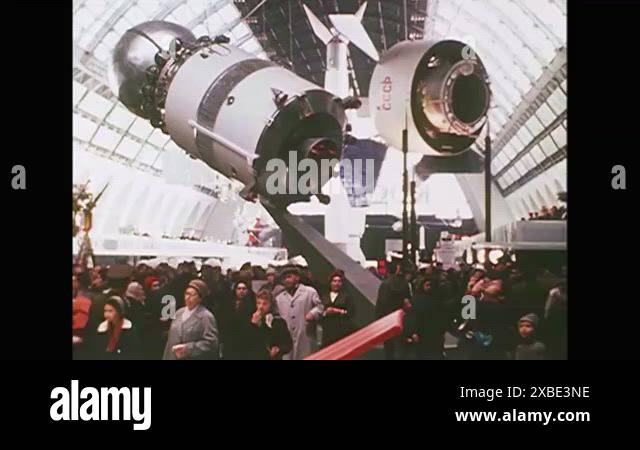 1968 - Russians visit an exhibit about the Soviet space program where ...