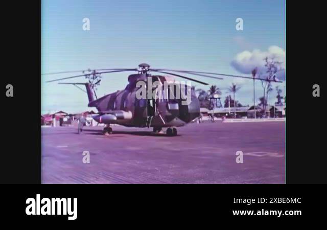 1967 - USAF helicopter and Sky Raider pilots prepare for a rescue ...