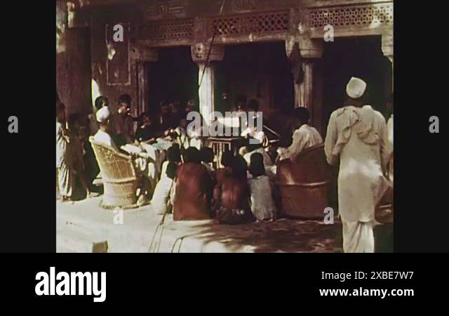 1965 - Indian families listen to a radio program about birth control ...