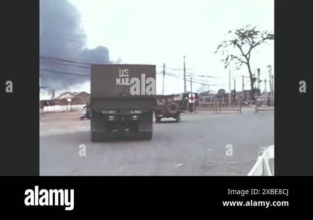 1968 - US Army trucks and ambulances drive through Tan Son Nhut Air ...