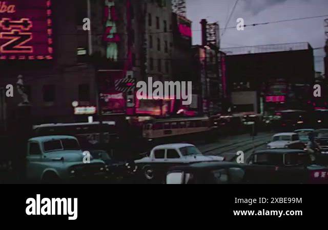 1963 - In this exploitation movie, cars drive through downtown Osaka ...