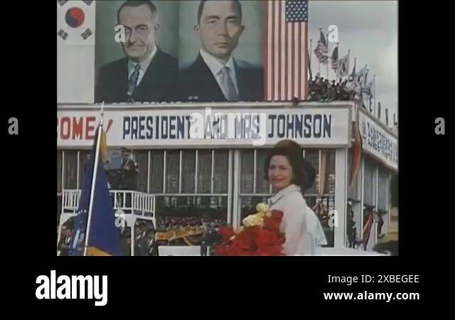 President Lyndon Johnson and his wife are shown at Kimpo Airfield and ...