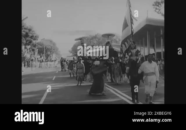 1962 - Girls and women march in a parade in Vietnam during the Vietnam ...