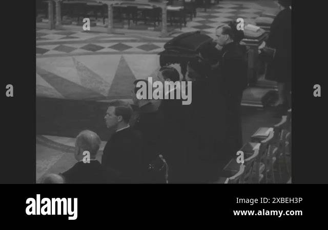 1965 - The Royal Family stands by as Winston Churchill's casket is carried out of St. Paul's ...