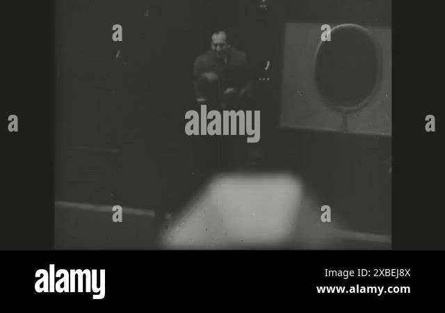 1940s - Nazi officials arrive at a train station, while soldiers are ...