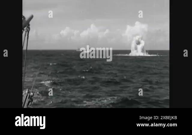 1943 - US Navy minesweepers blow up mines in the ocean Stock Video ...