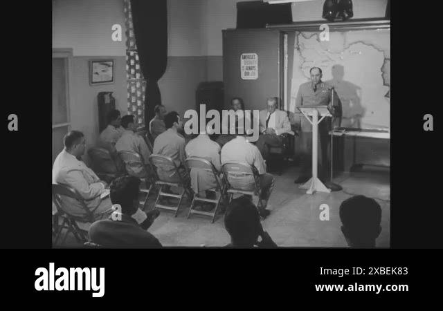 A military briefing is shown and servicemen receive certificates and a ...