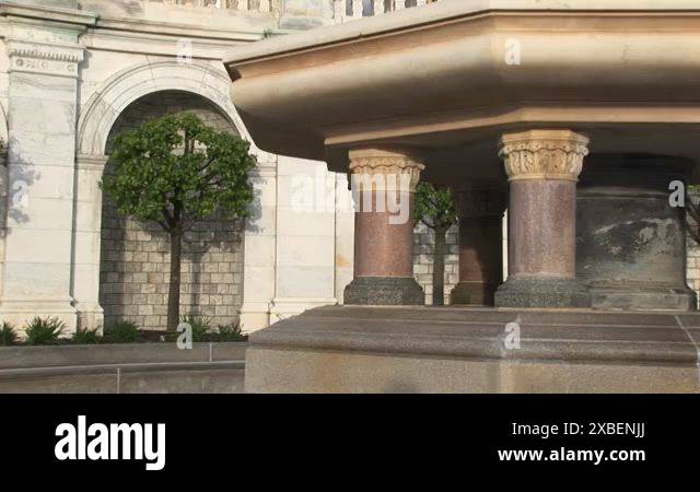 The camera pans up the facade of the U.S. Capitol building, from the ...