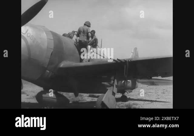 1944 - A USAAF pilot gets out of his plane at a Saipan air base, and ...