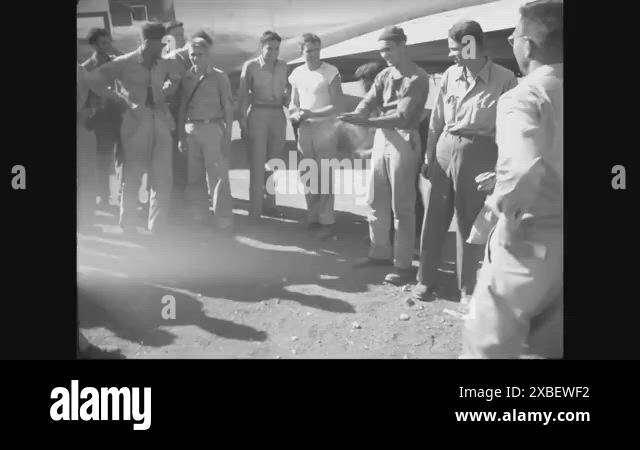 Vietnam War, soldiers of the 22nd Replacement Battalion relax, wave from a jeep and ride away ...