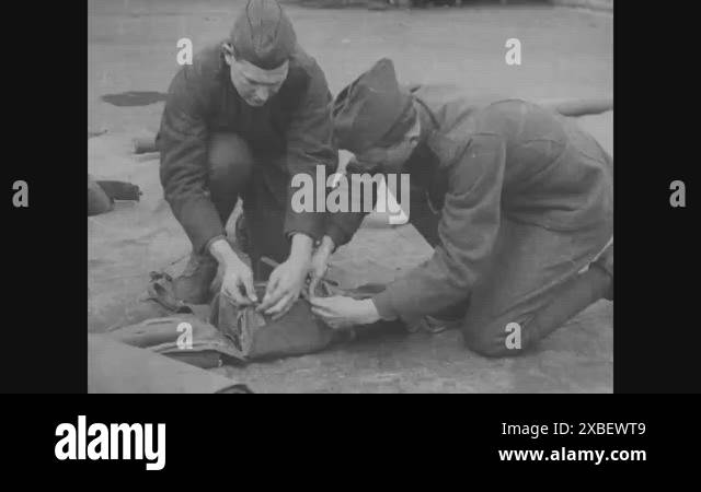 Soldiers pack their backpack at the Le Mans Embarkation Center, World ...