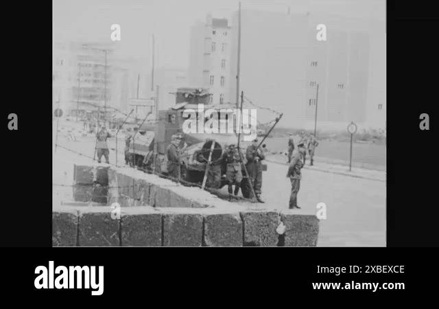 1963 - East Berliners evacuate to the West side, prompting the ...