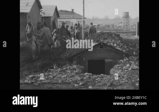 1918 - Indochinese laborers, hired by the US Army, excavate a prison ...