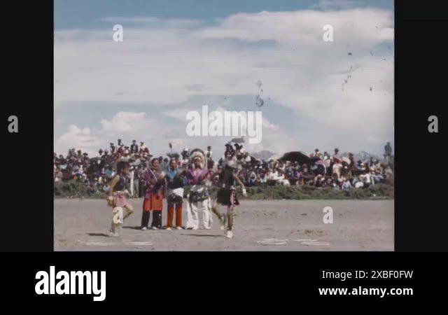 Native Americans in full traditional dress perform traditional dances ...