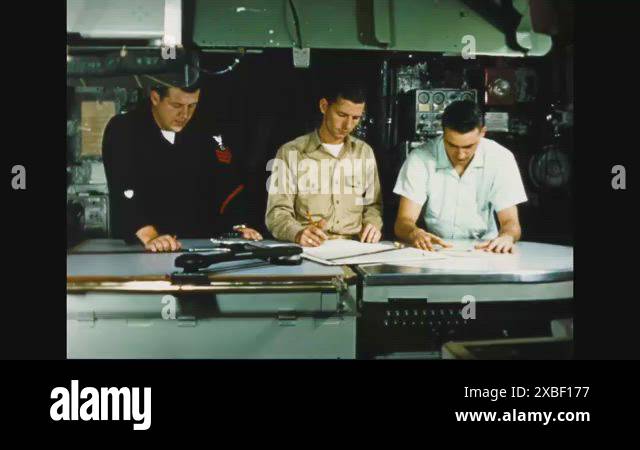 1960s - US Navy seamen use maps and tools to build a route for their ...