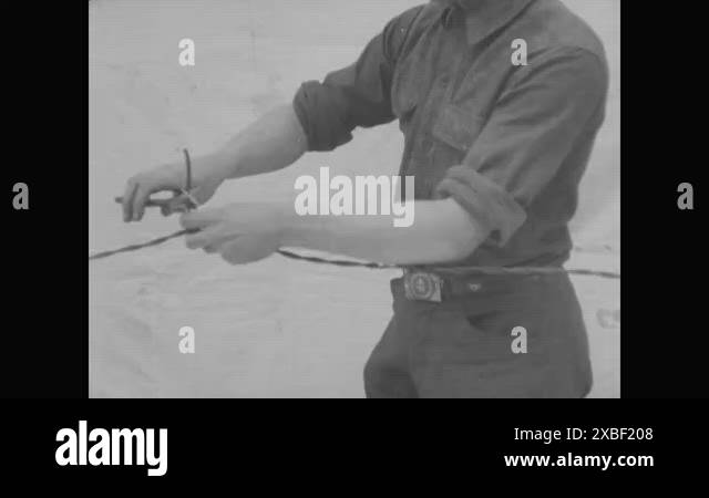 1918 - An American soldier splices twisted copper wire Stock Video ...