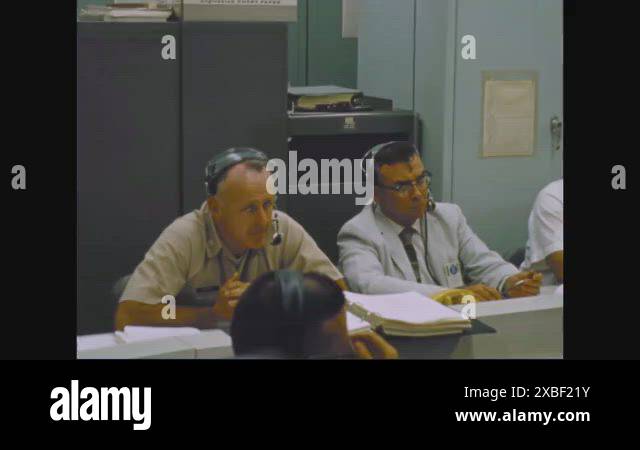 1965 - NASA personnel in the control room monitoring a Gemini 6 wet ...