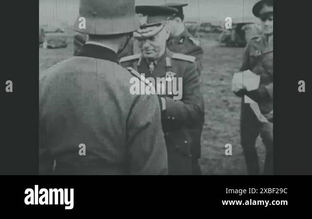 1940s - A Nazi officer presents soldiers with medals, and departs on a ...