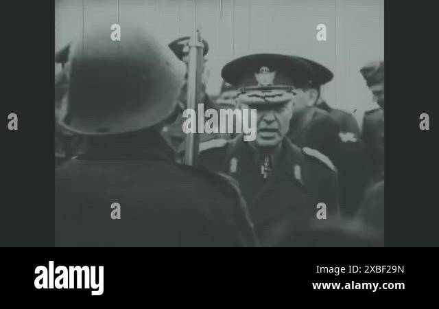 1940s - A Nazi officer inspects troops and is shown an army horse ...