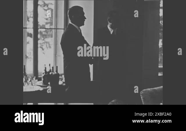 1940s - Adolf Hitler in a room, and Hitler, Eva Braun, Gretl Braun, and ...