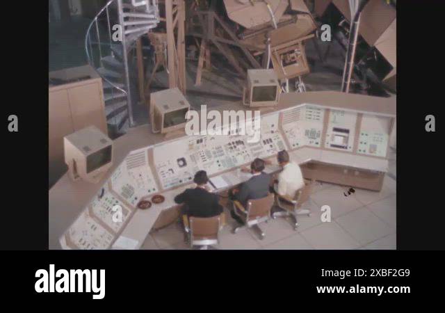 1966 - Aerial view of the control room panel, and inside the Apollo ...
