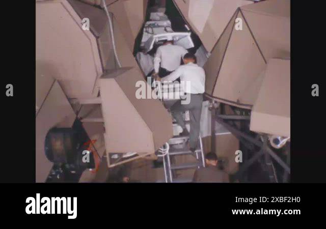 1966 - NASA personnel entering the Apollo Mission Simulator and inside ...